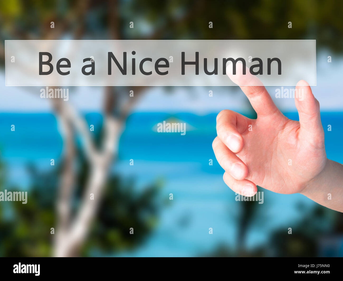 Be a Nice Human - Hand pressing a button on blurred background concept ...