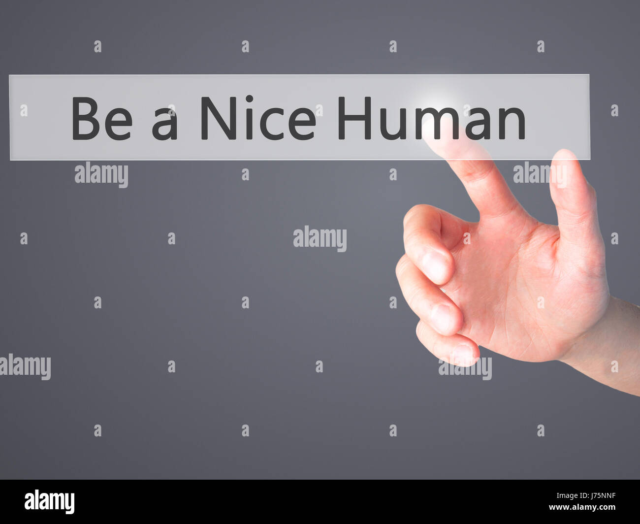 Be a Nice Human - Hand pressing a button on blurred background concept ...