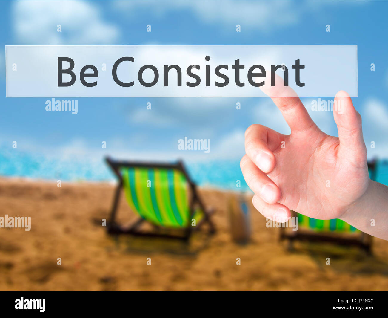 Be Consistent - Hand pressing a button on blurred background concept ...