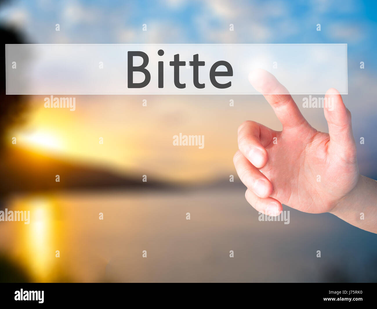 Bitte (Please in German) - Hand pressing a button on blurred background ...
