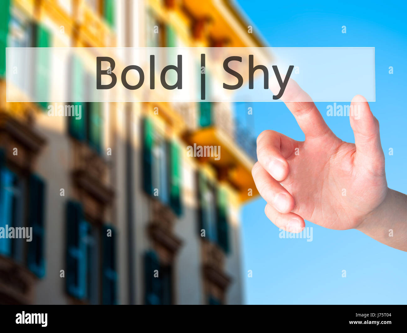 Bold Shy - Hand pressing a button on blurred background concept ...