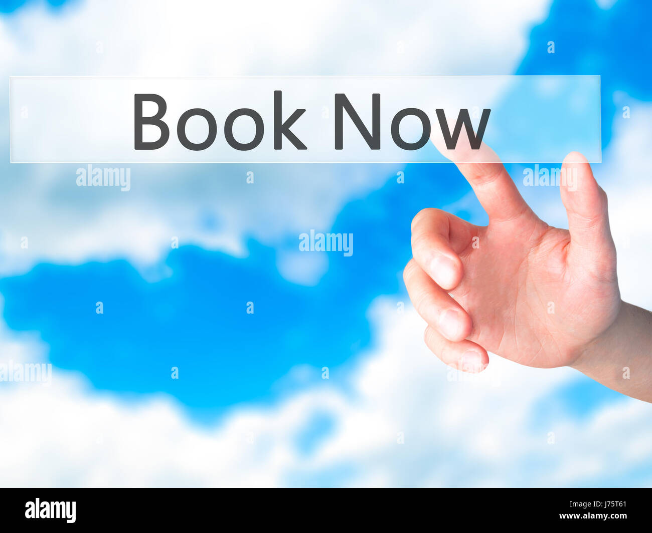 Book Now - Hand pressing a button on blurred background concept ...