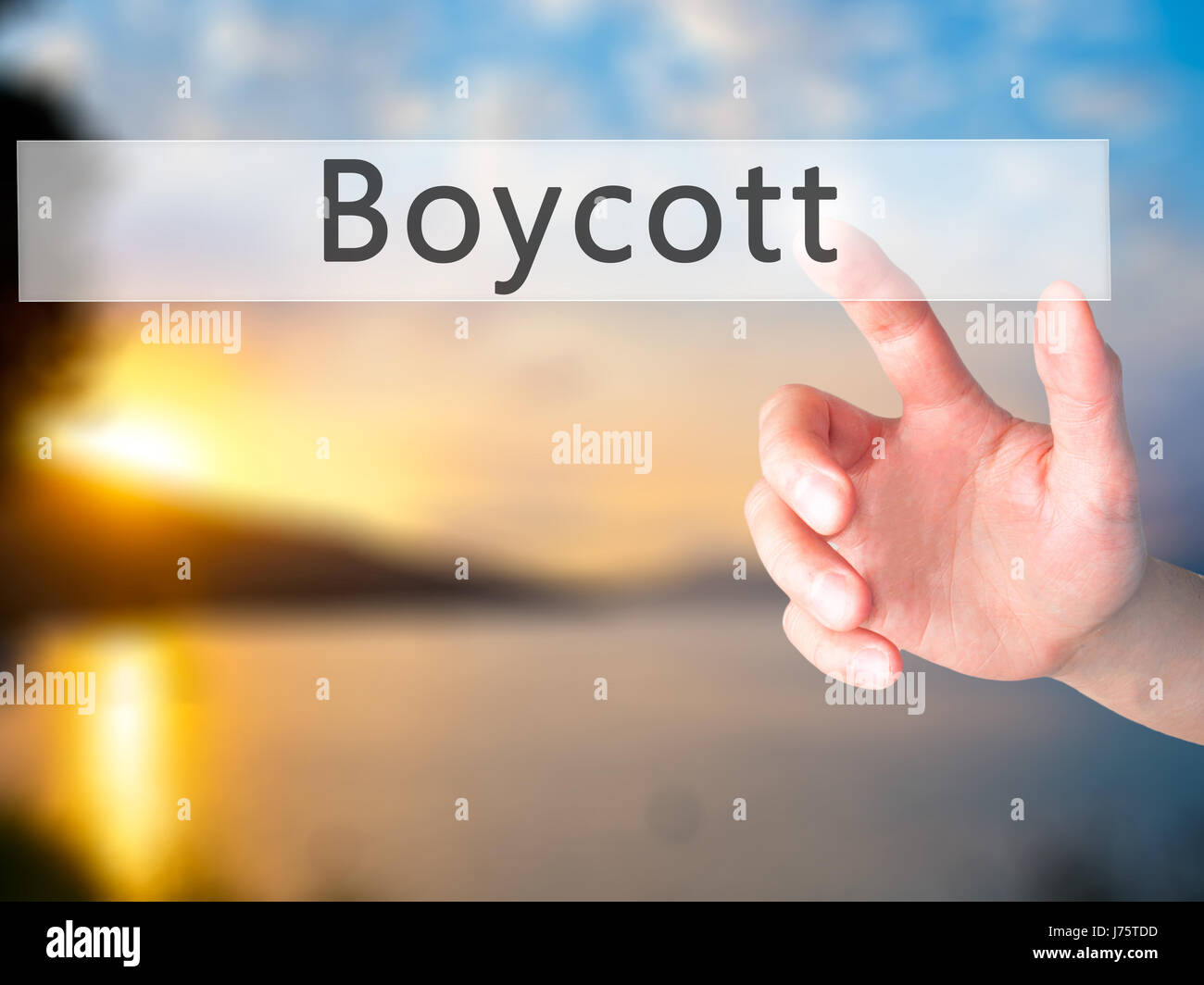 Boycott - Hand pressing a button on blurred background concept ...