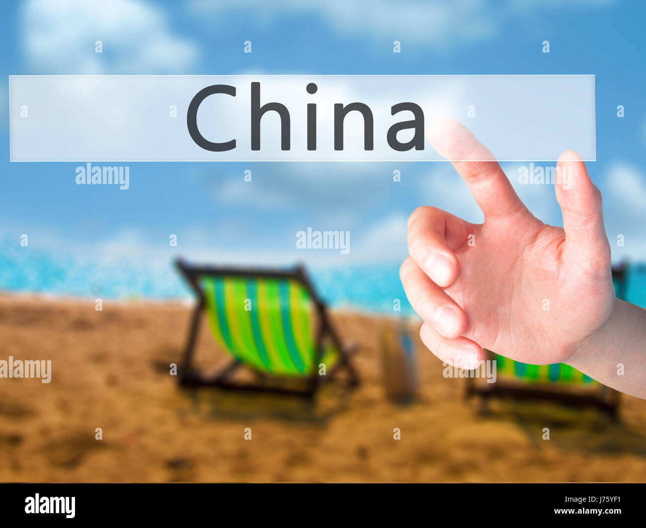 China - Hand pressing a button on blurred background concept . Business ...