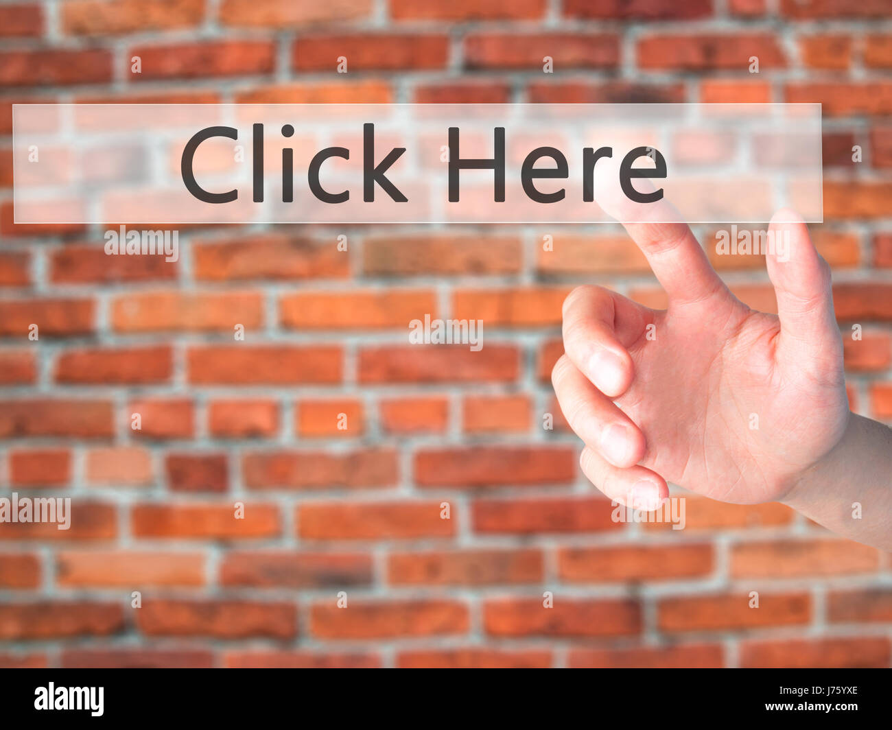 Click Here - Hand pressing a button on blurred background concept ...