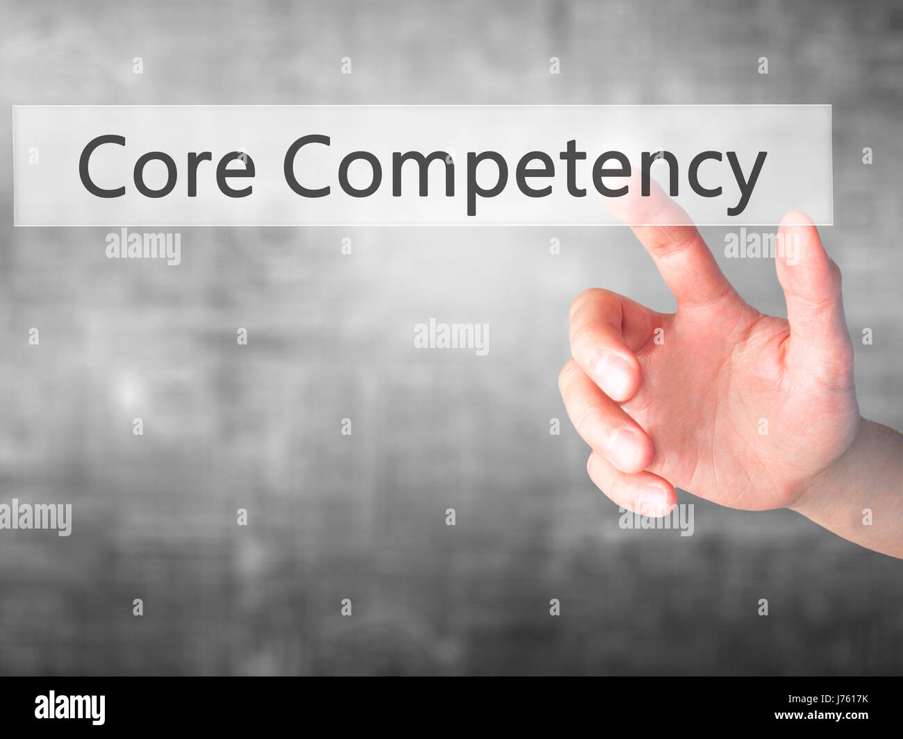Core Competency - Hand pressing a button on blurred background concept ...