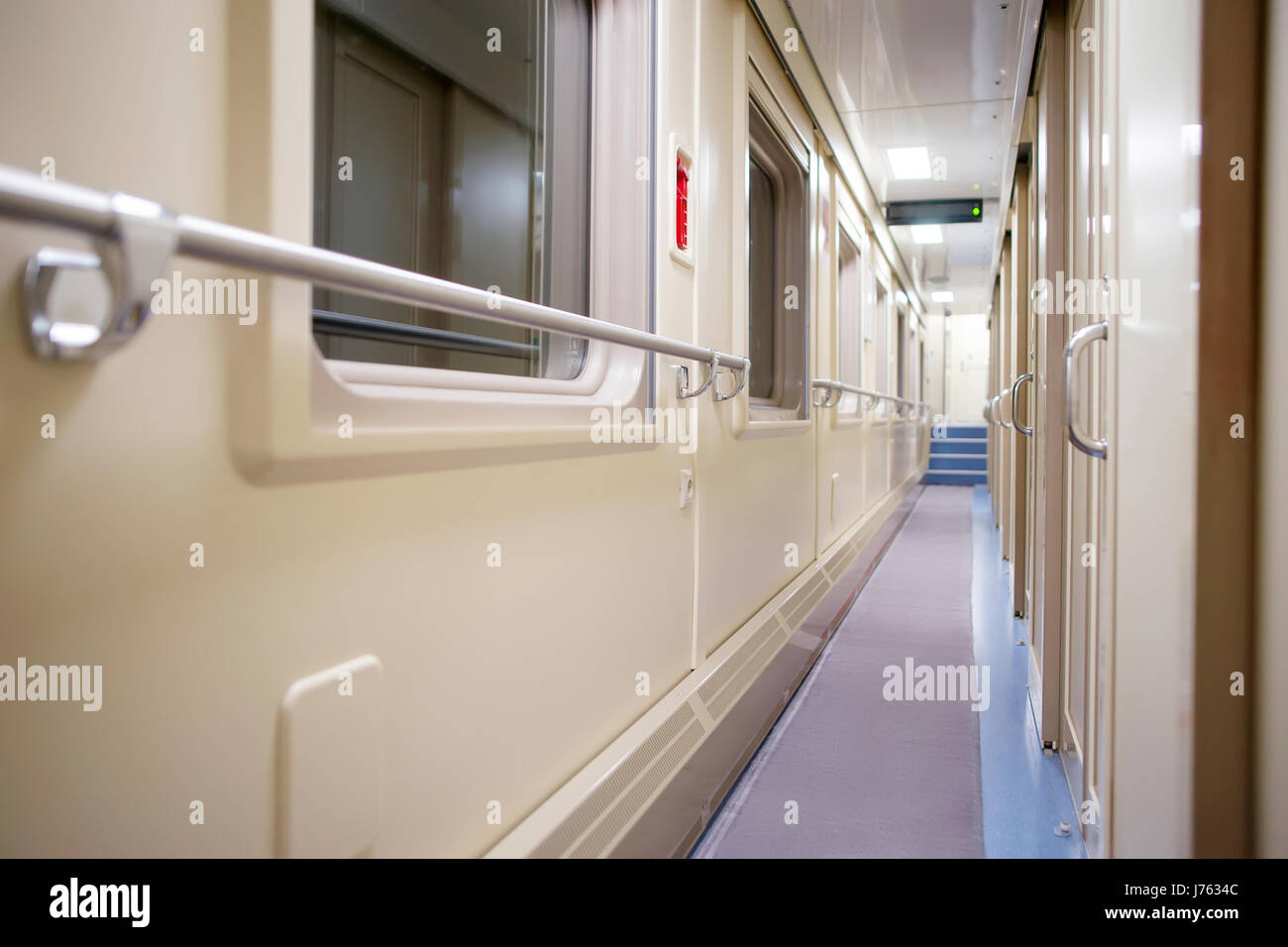 Corridor in the modern compartment car. Selective focus Stock Photo - Alamy