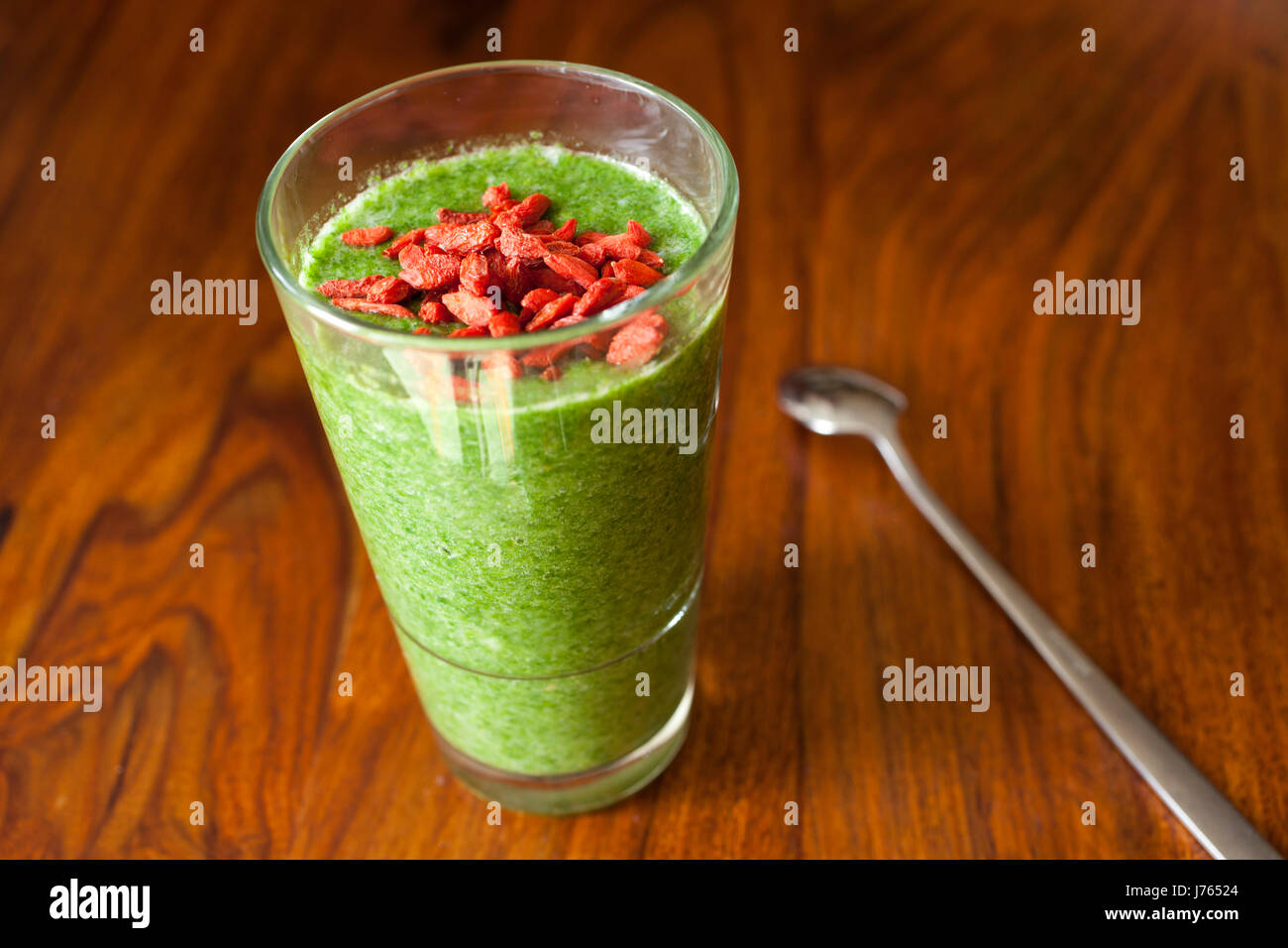 healthy spinach smoothie in a high glass Stock Photo - Alamy