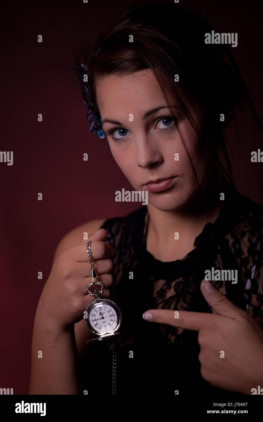 woman with clock Stock Photo - Alamy
