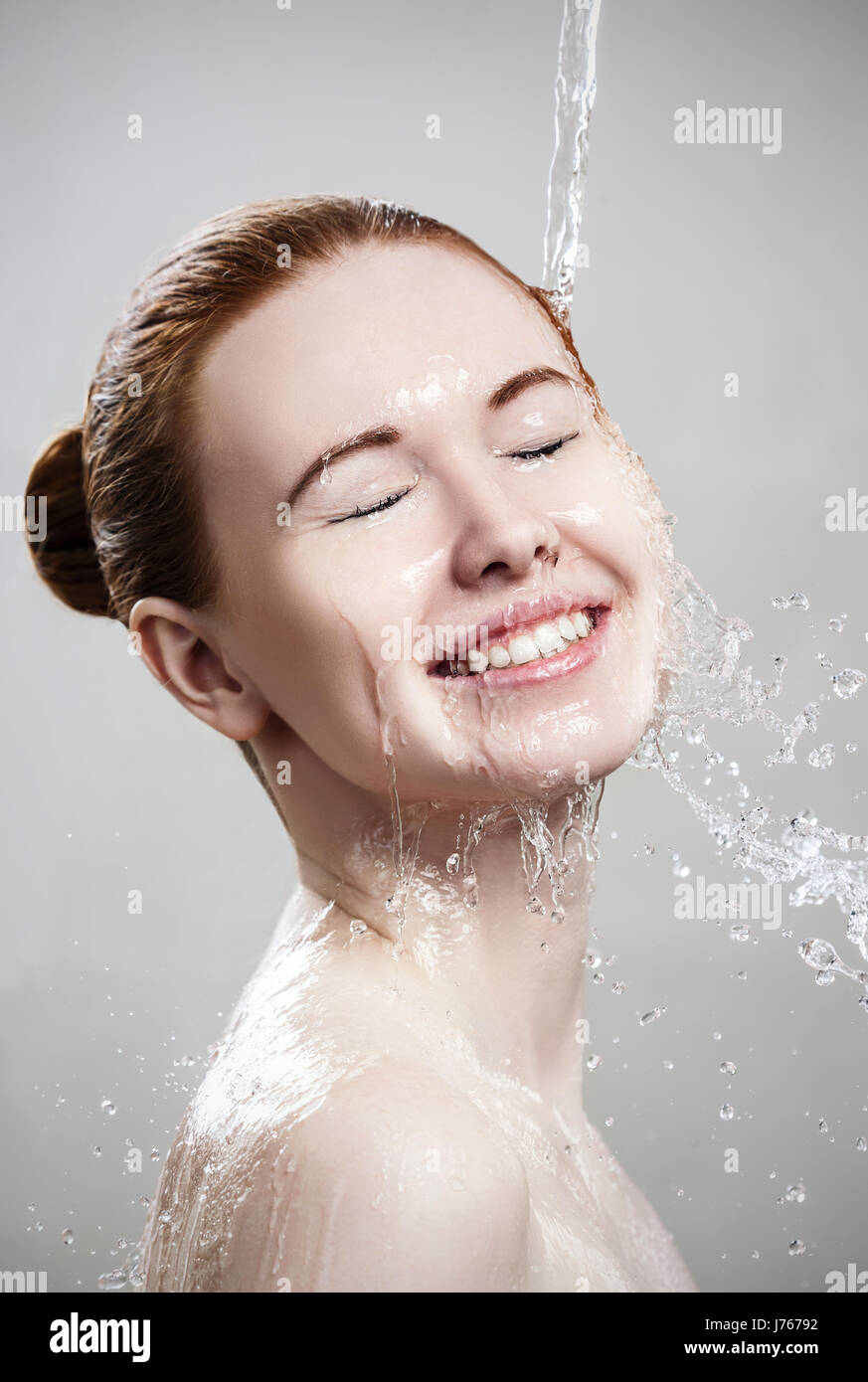Woman splashing about in water hi-res stock photography and images - Alamy
