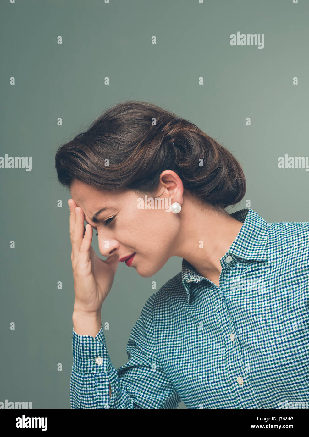 Woman forehead 1950s hi-res stock photography and images - Alamy