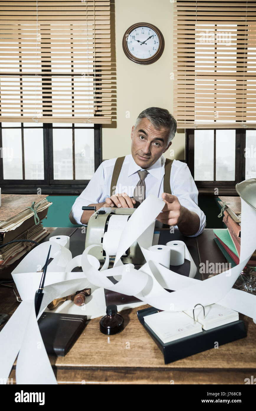 Busy vintage accountant adding machine hi-res stock photography and ...