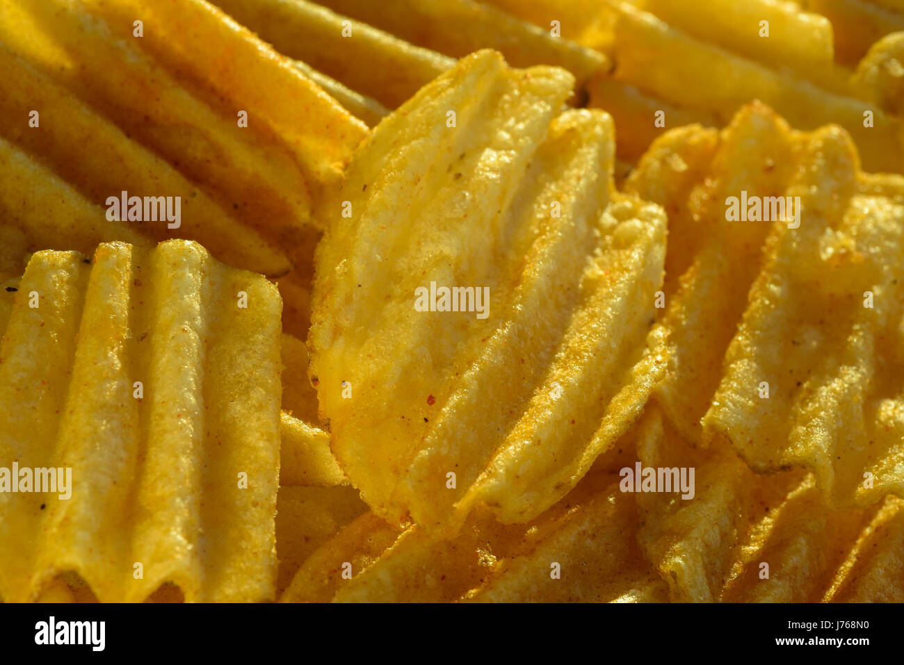 Chips pattern. Yellow salted potato chips as background. Chips texture ...
