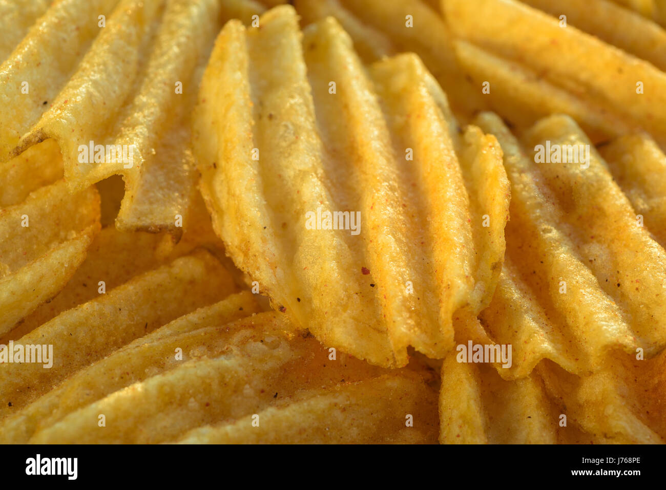 Chips pattern. Yellow salted potato chips as background. Chips texture ...
