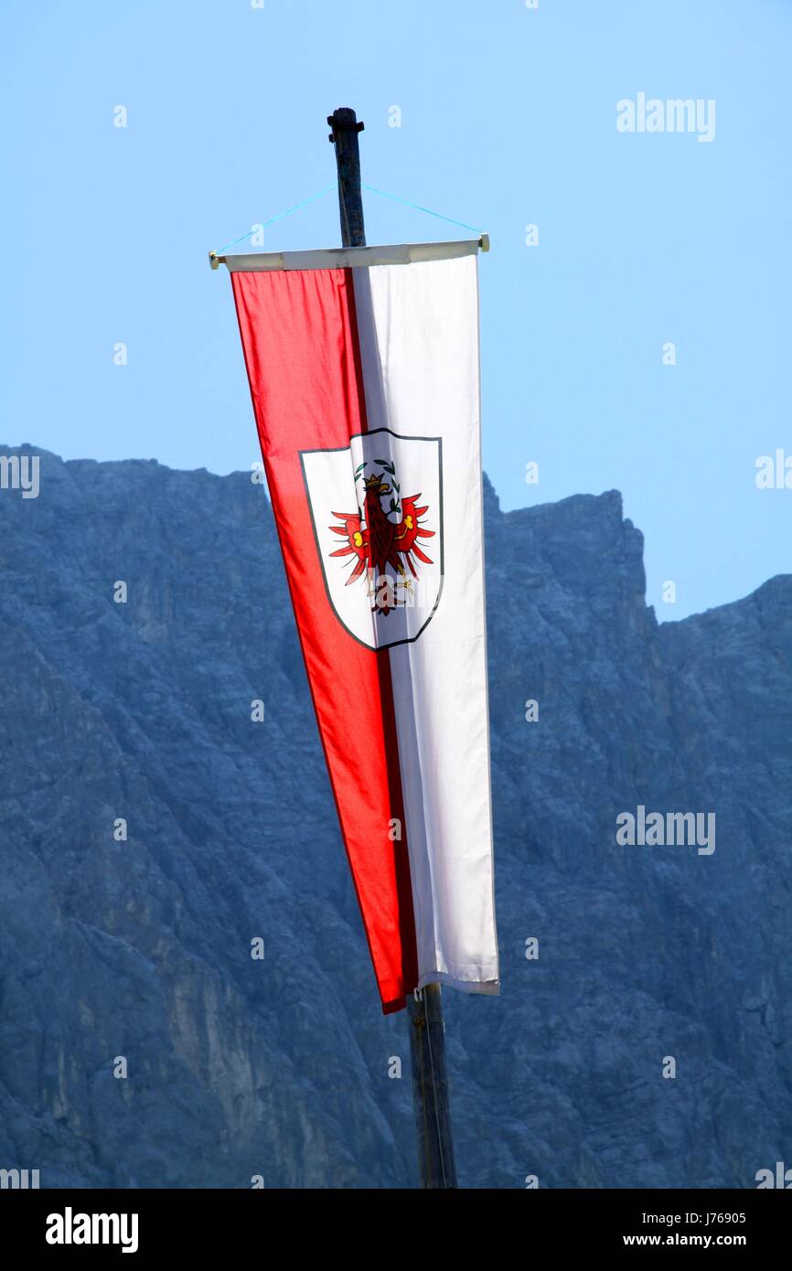 mountains austrians flag eagle mast emblem tyrol blue green shine ...