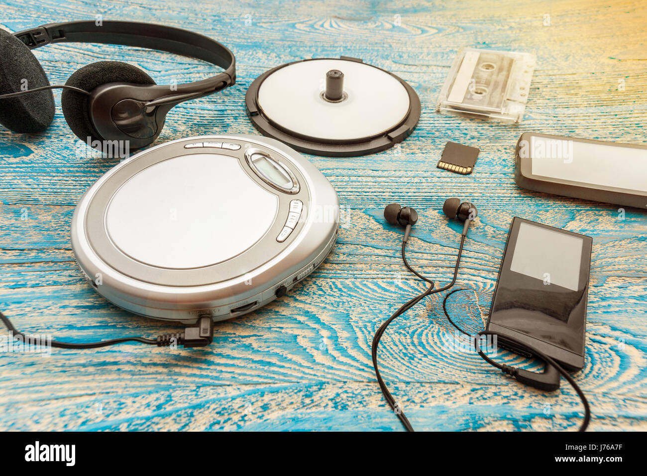 The photo shows a Cd player on a blue background Stock Photo - Alamy
