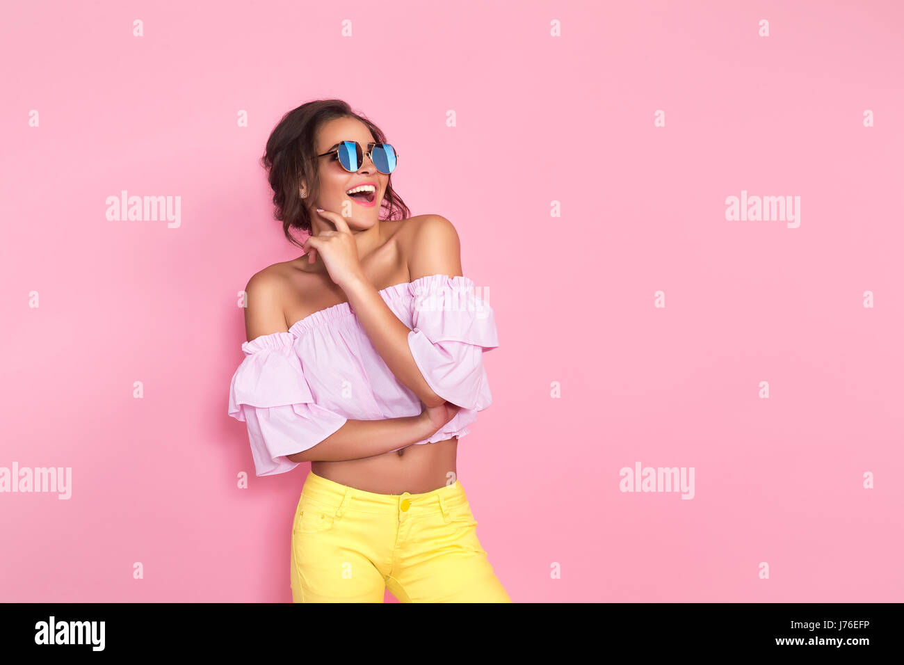 Women wearing bright summer clothes hi-res stock photography and images ...