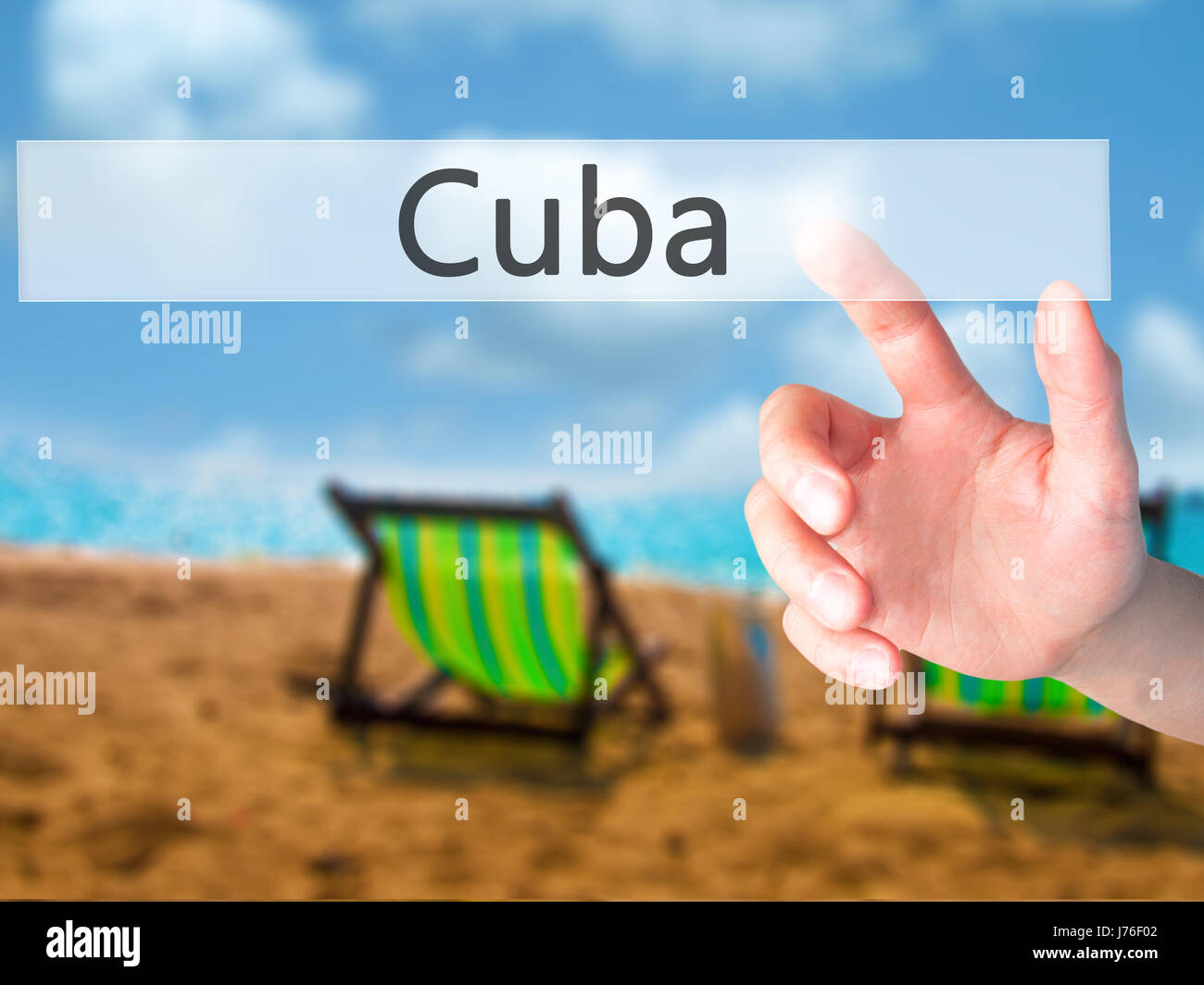 Cuba - Hand pressing a button on blurred background concept . Business ...
