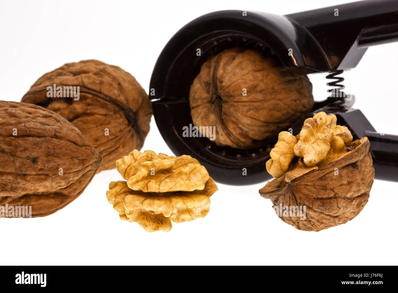 walnuts with nutcracker Stock Photo - Alamy