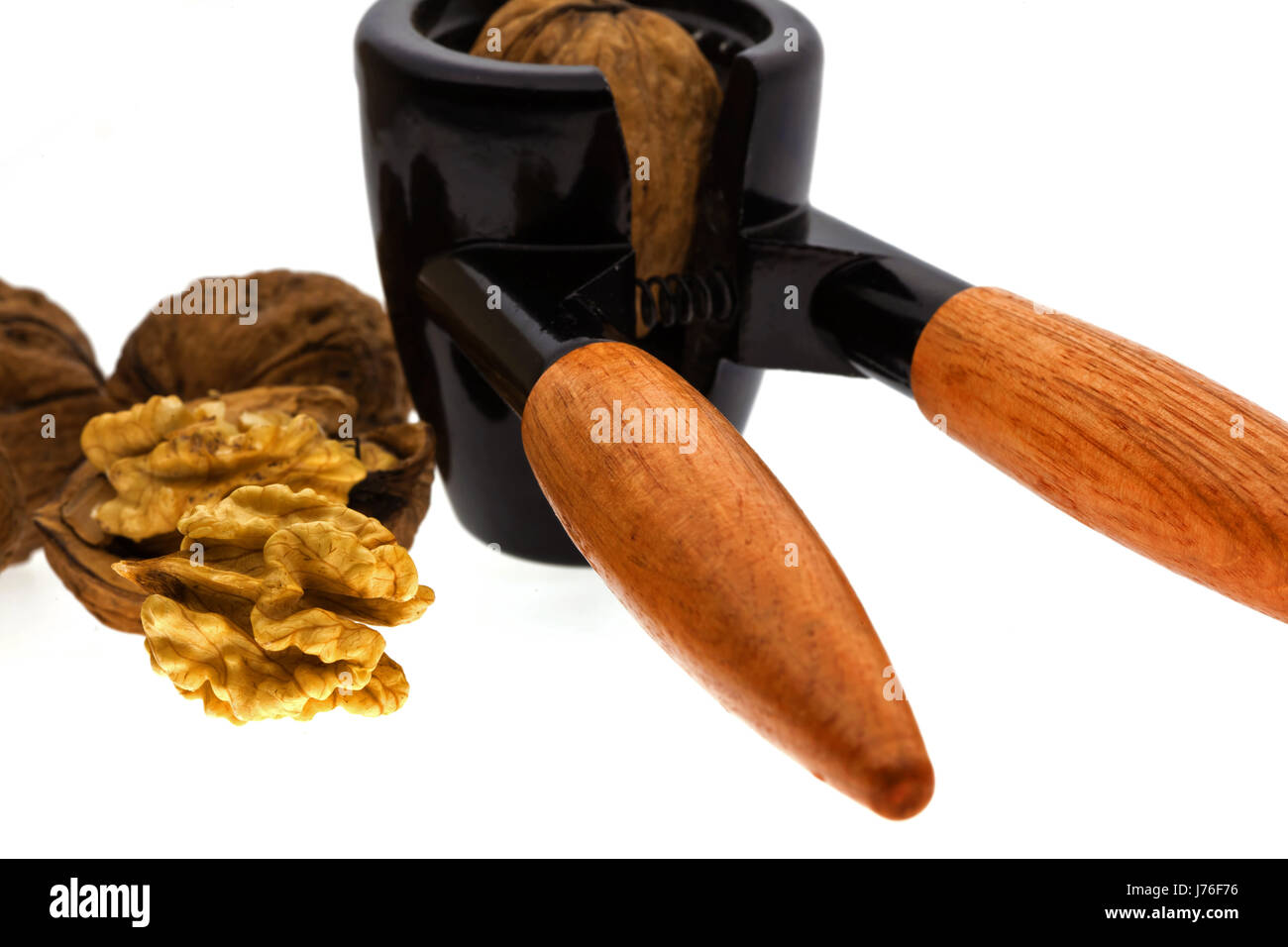 walnuts with nutcracker Stock Photo - Alamy