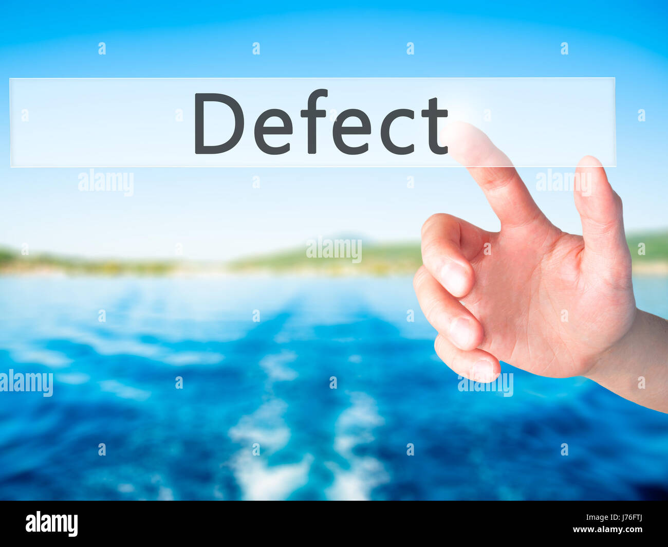 Defect - Hand pressing a button on blurred background concept ...