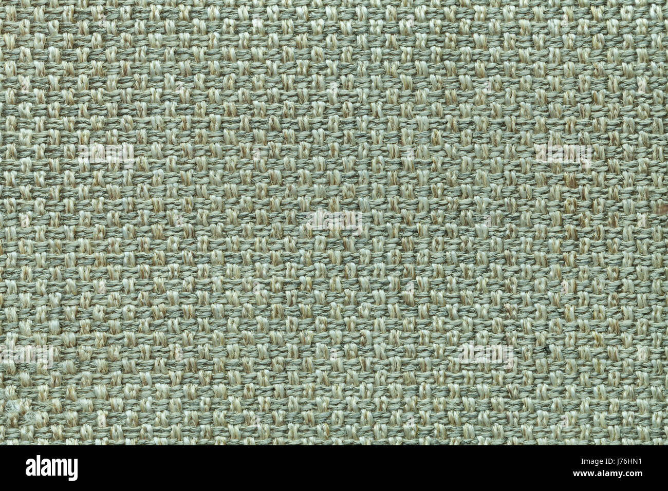 Light olive background with checkered pattern, closeup. Structure of ...