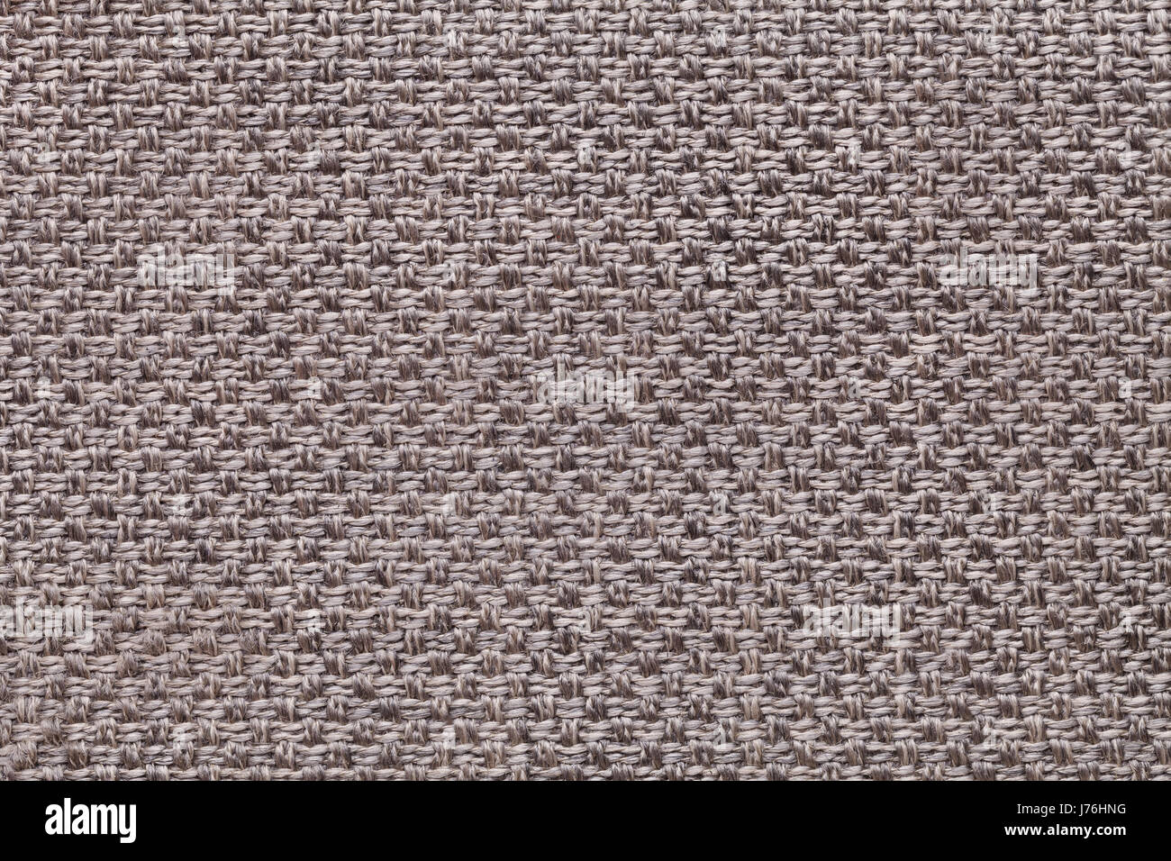 Light brown background with checkered pattern, closeup. Structure of ...