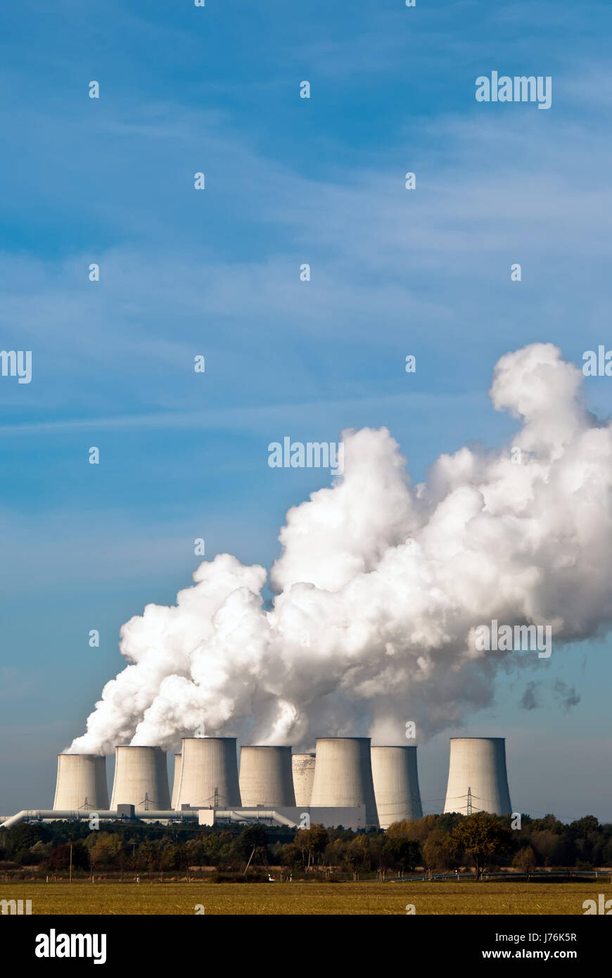 power plant cooling towers upright v3 Stock Photo - Alamy