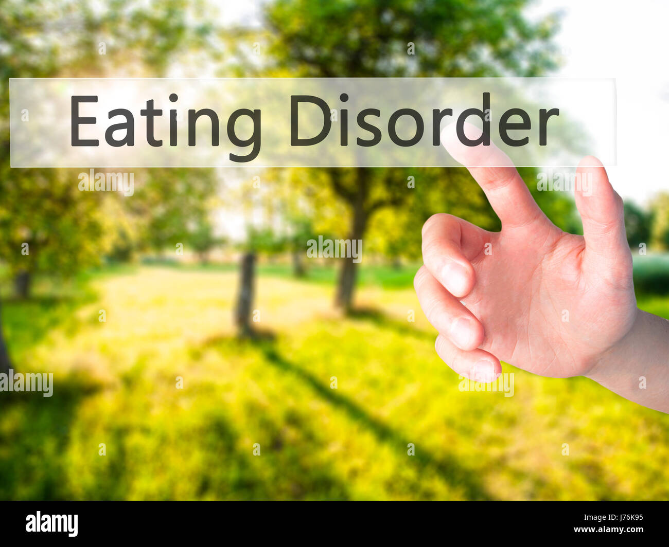 Eating Disorder - Hand pressing a button on blurred background concept ...