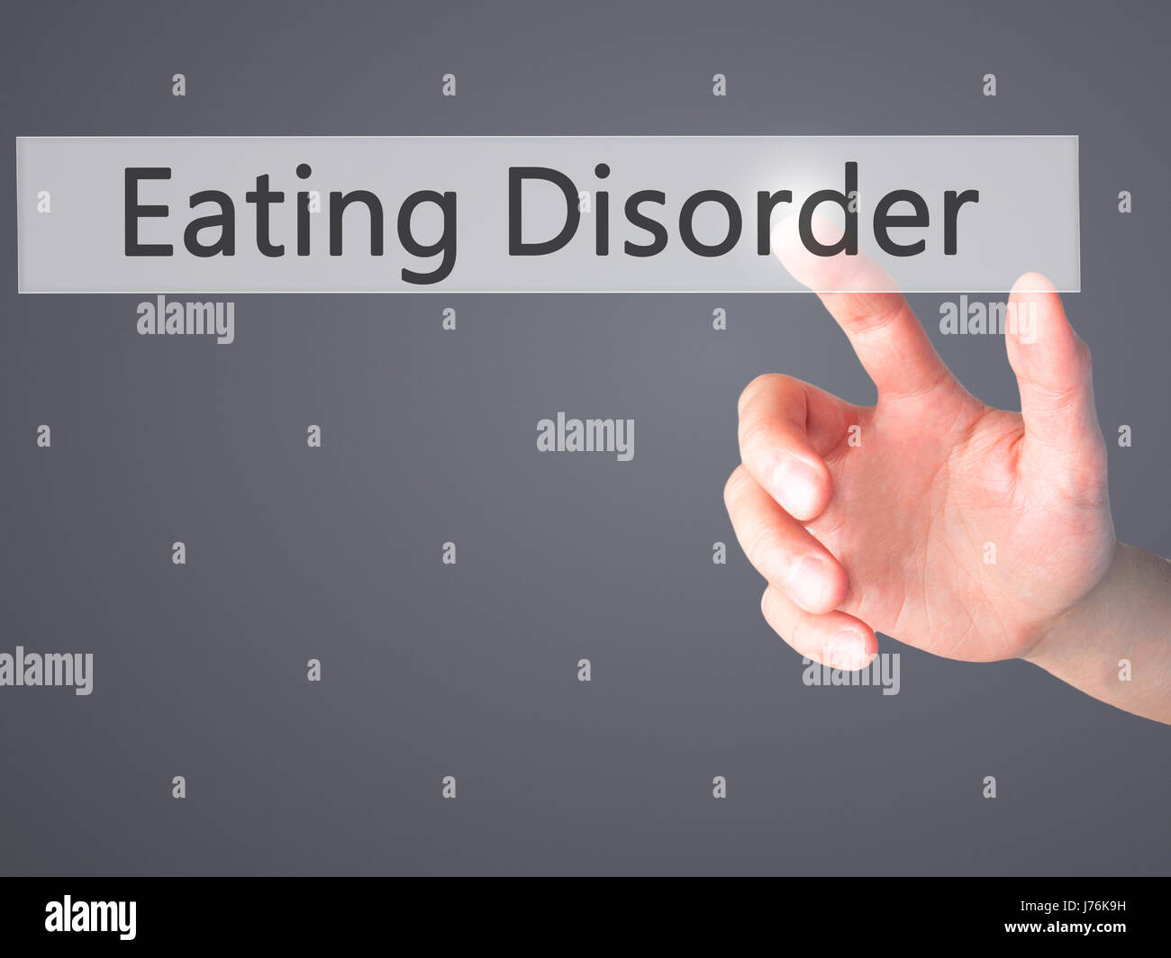 Eating Disorder - Hand pressing a button on blurred background concept ...