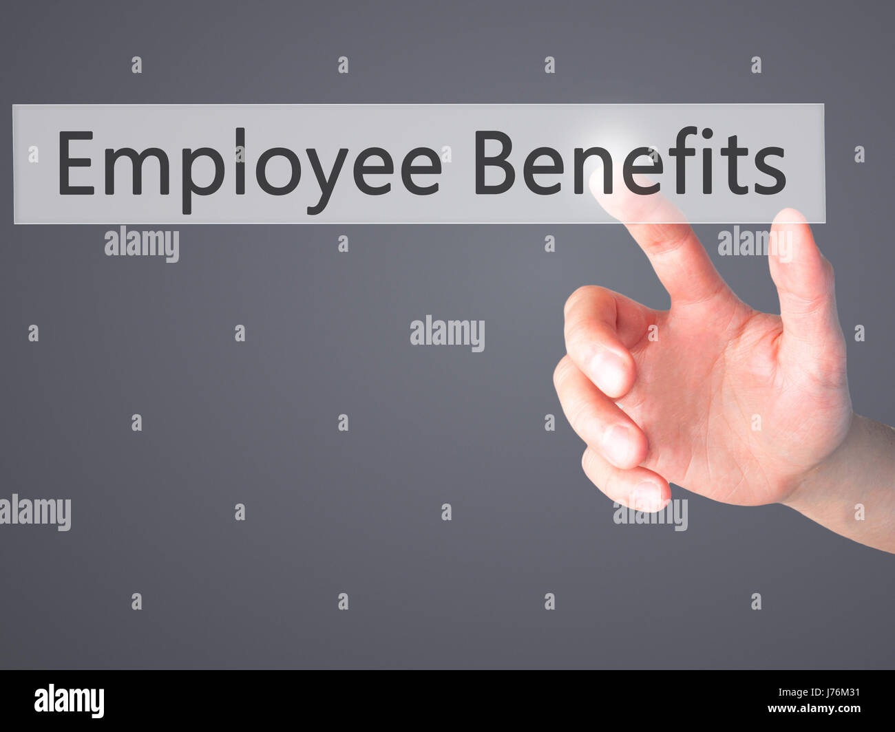 Employee Benefits - Hand pressing a button on blurred background ...
