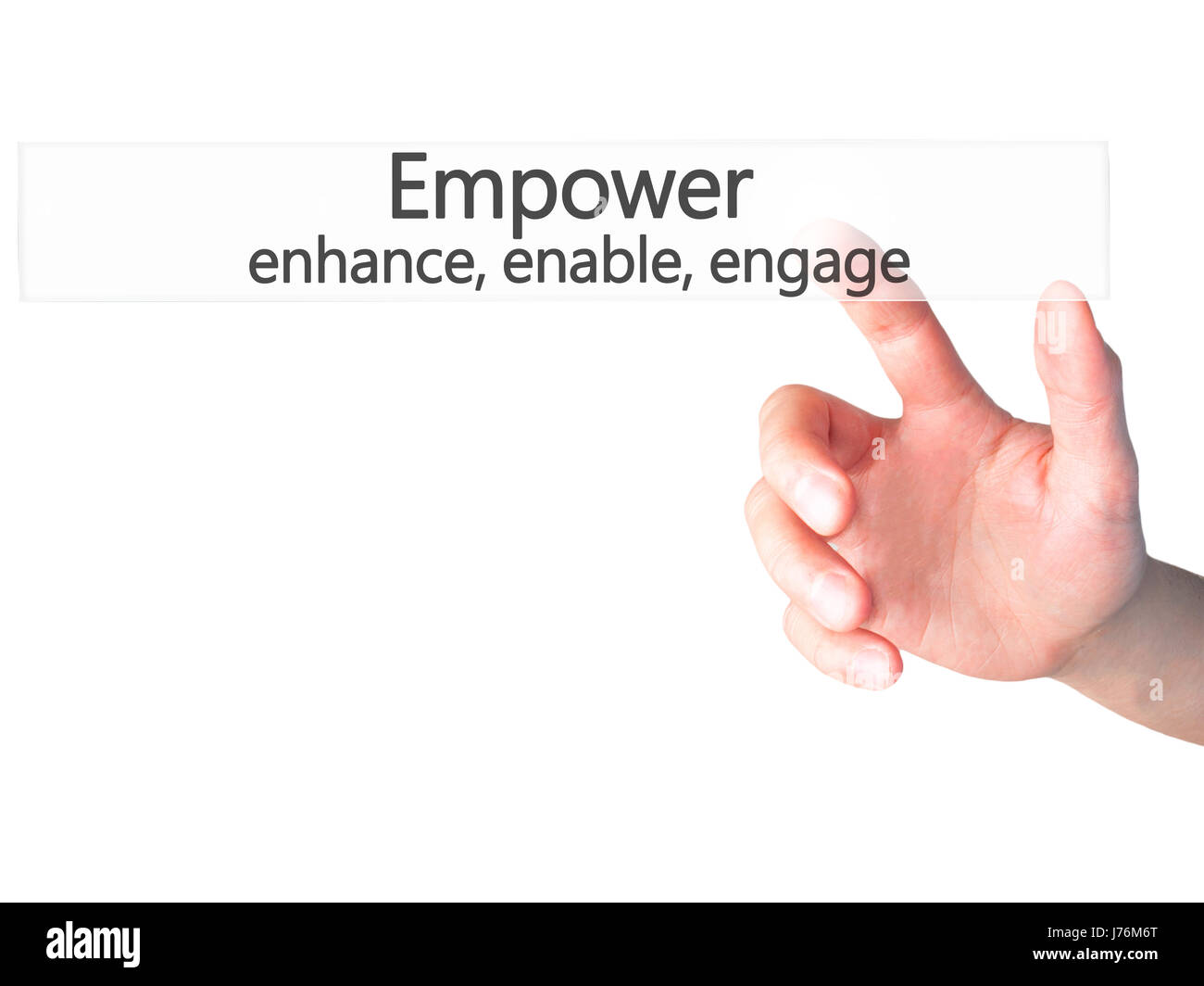 Empower enhance, enable, engage - Hand pressing a button on blurred ...