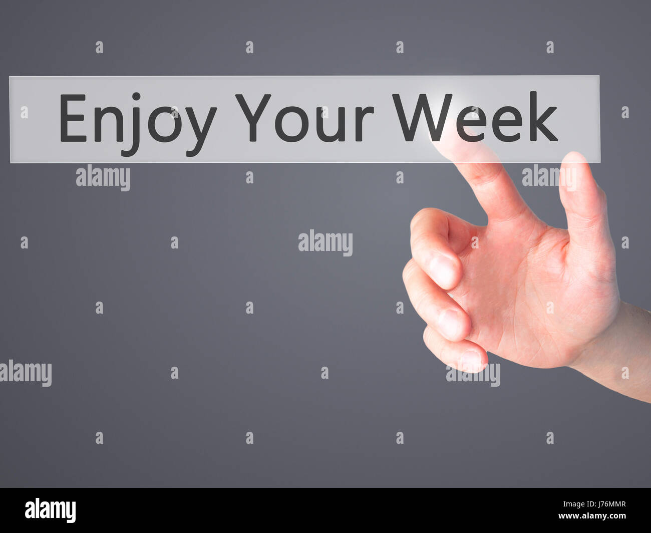 Enjoy Your Week - Hand pressing a button on blurred background concept ...