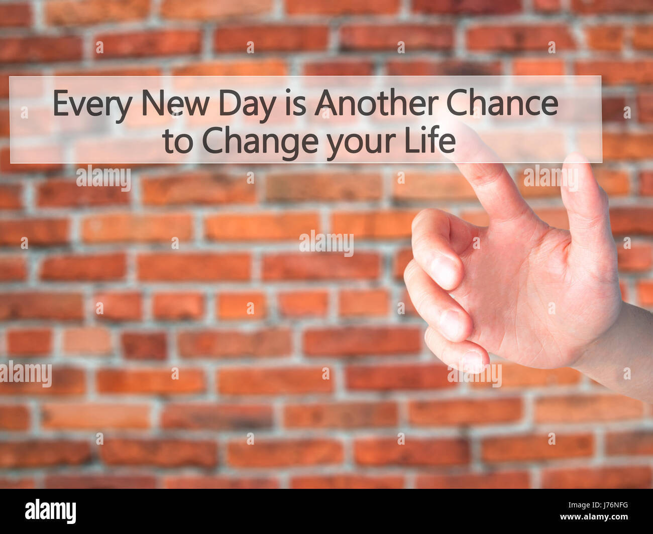 Every New Day is Another Chance to Change your Life - Hand pressing a ...