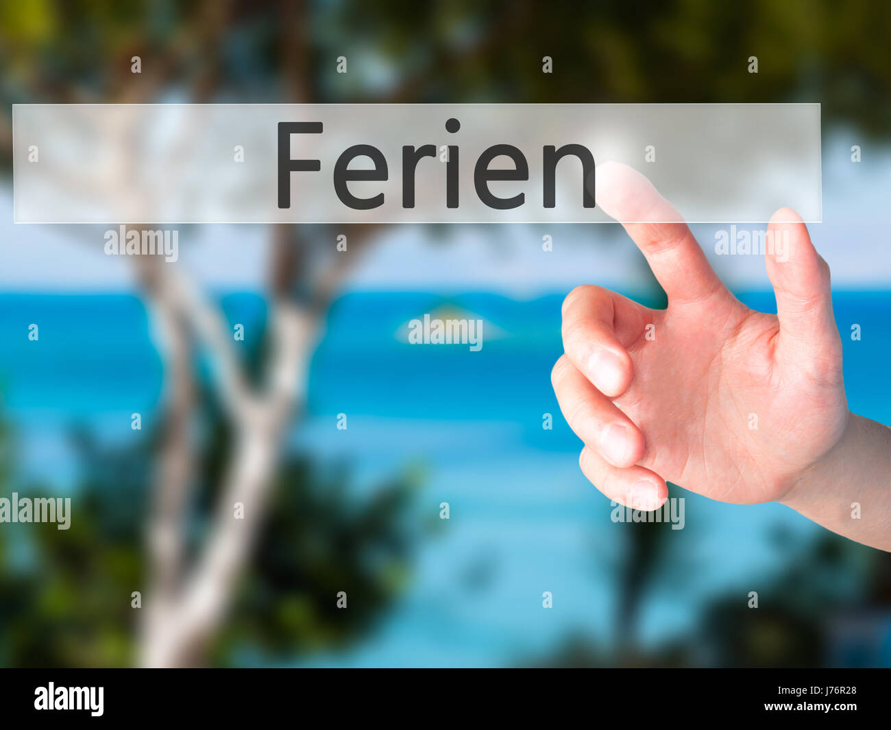Ferien (Vacation in German) - Hand pressing a button on blurred ...
