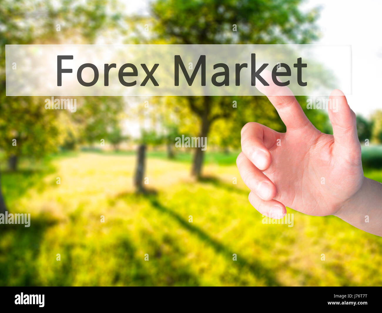 Forex Market - Hand pressing a button on blurred background concept ...