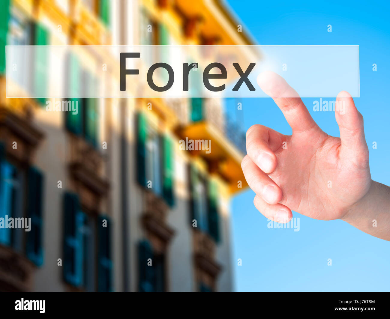 Forex - Hand pressing a button on blurred background concept . Business ...
