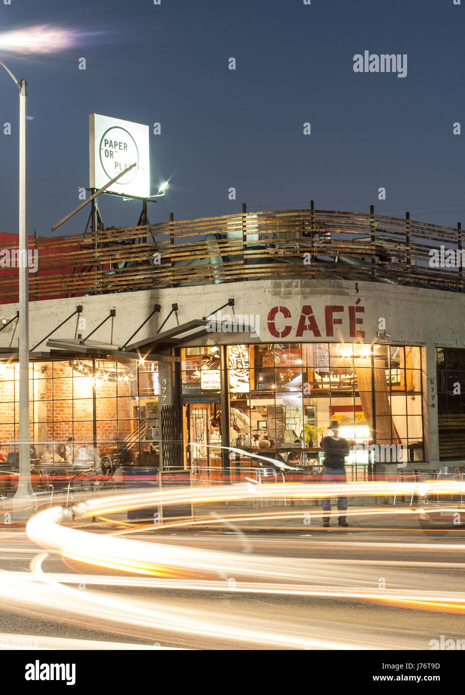 street view of the cafe with night lights Stock Photo - Alamy