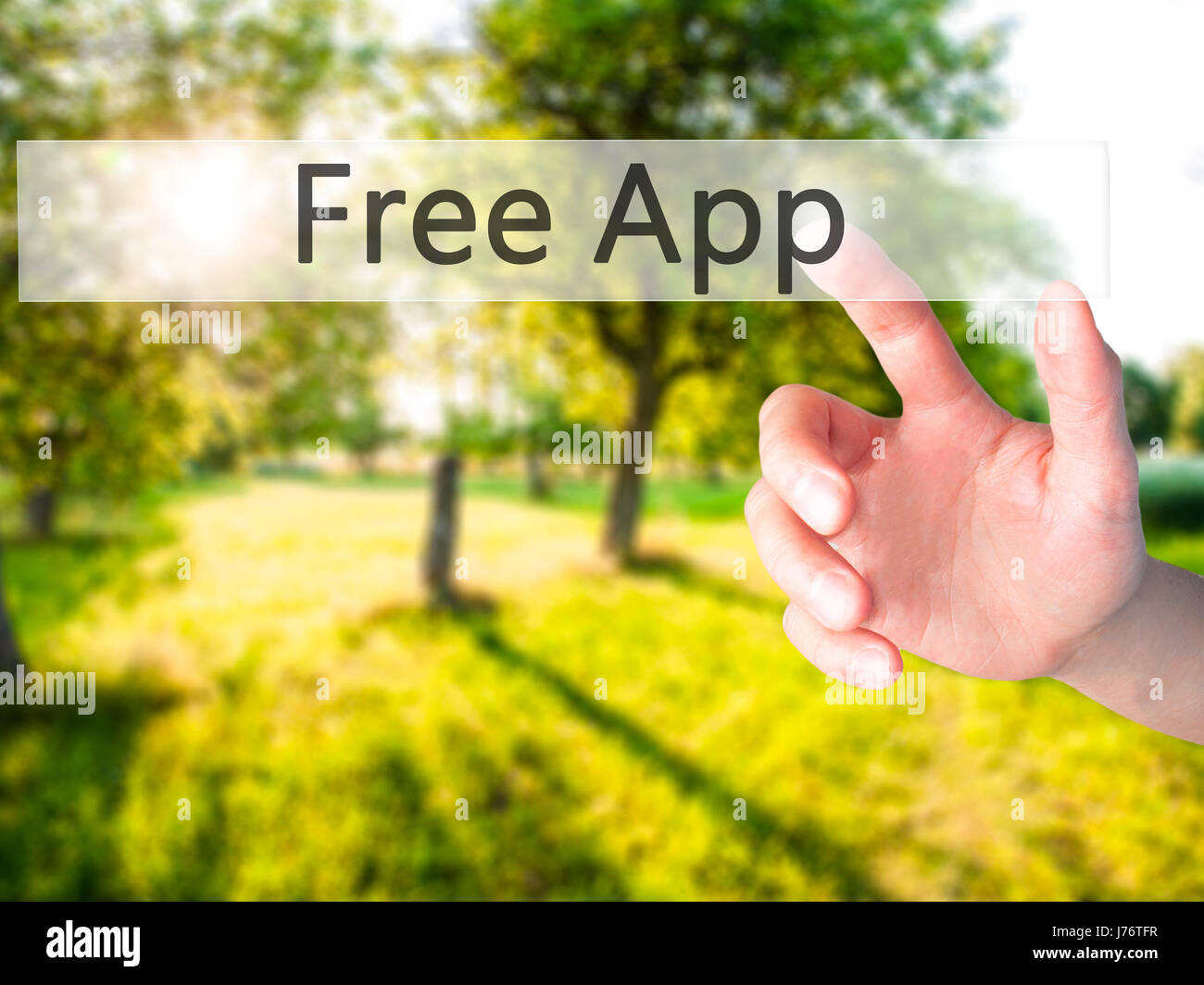 Free App - Hand pressing a button on blurred background concept ...