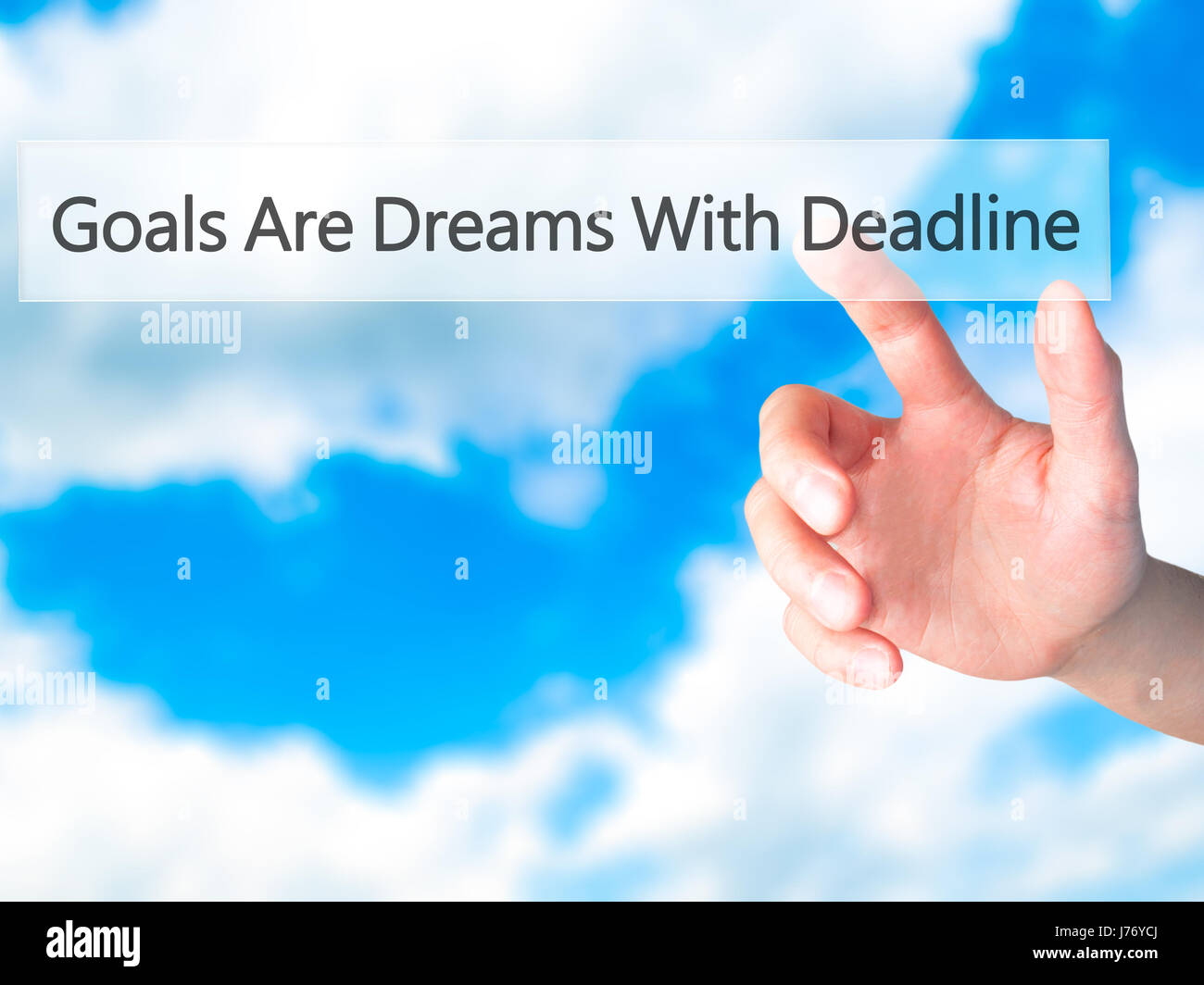 Goals Are Dreams With Deadline - Hand pressing a button on blurred ...