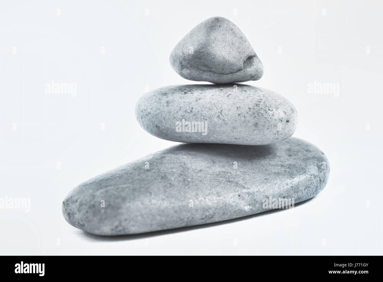 Pile of three yellow stones isolated on a white background Stock Photo ...