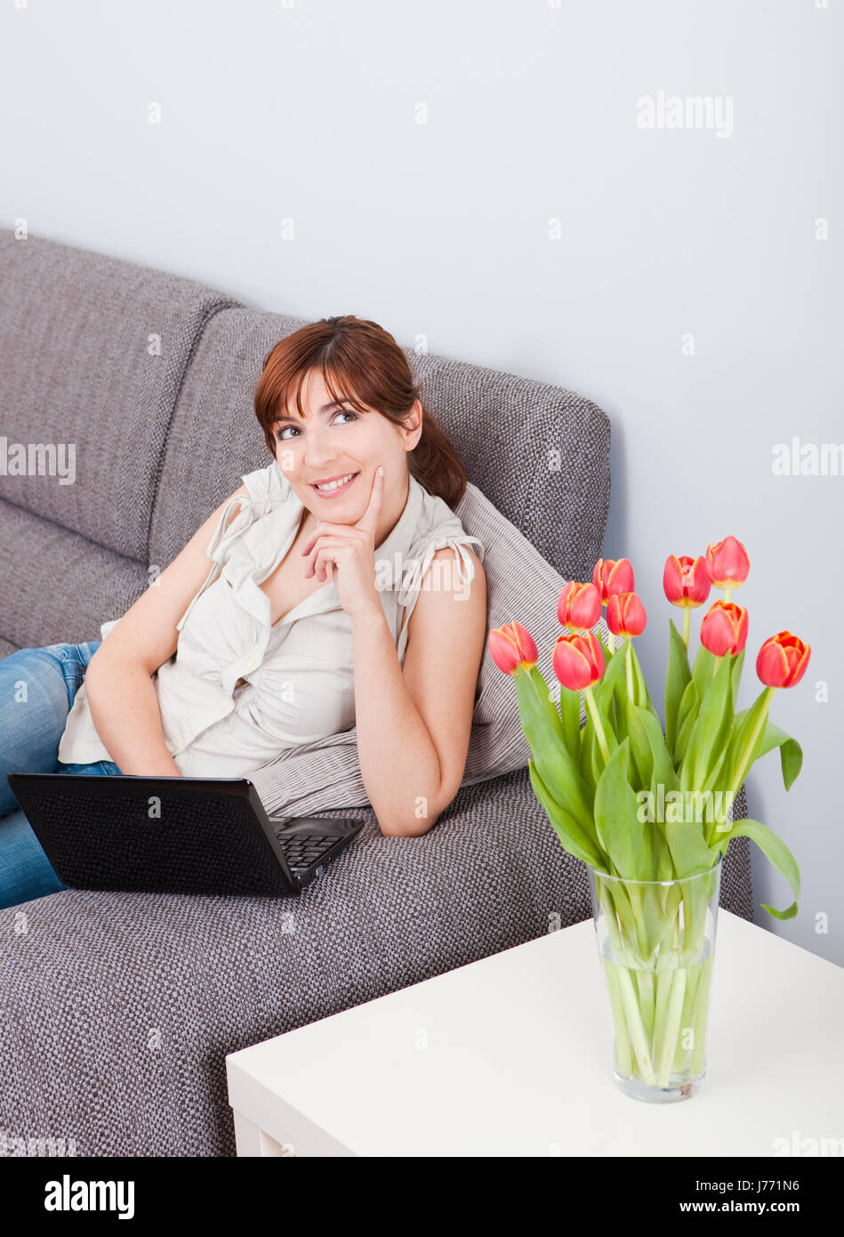 woman laptop notebook computers computer couch technology delighted ...