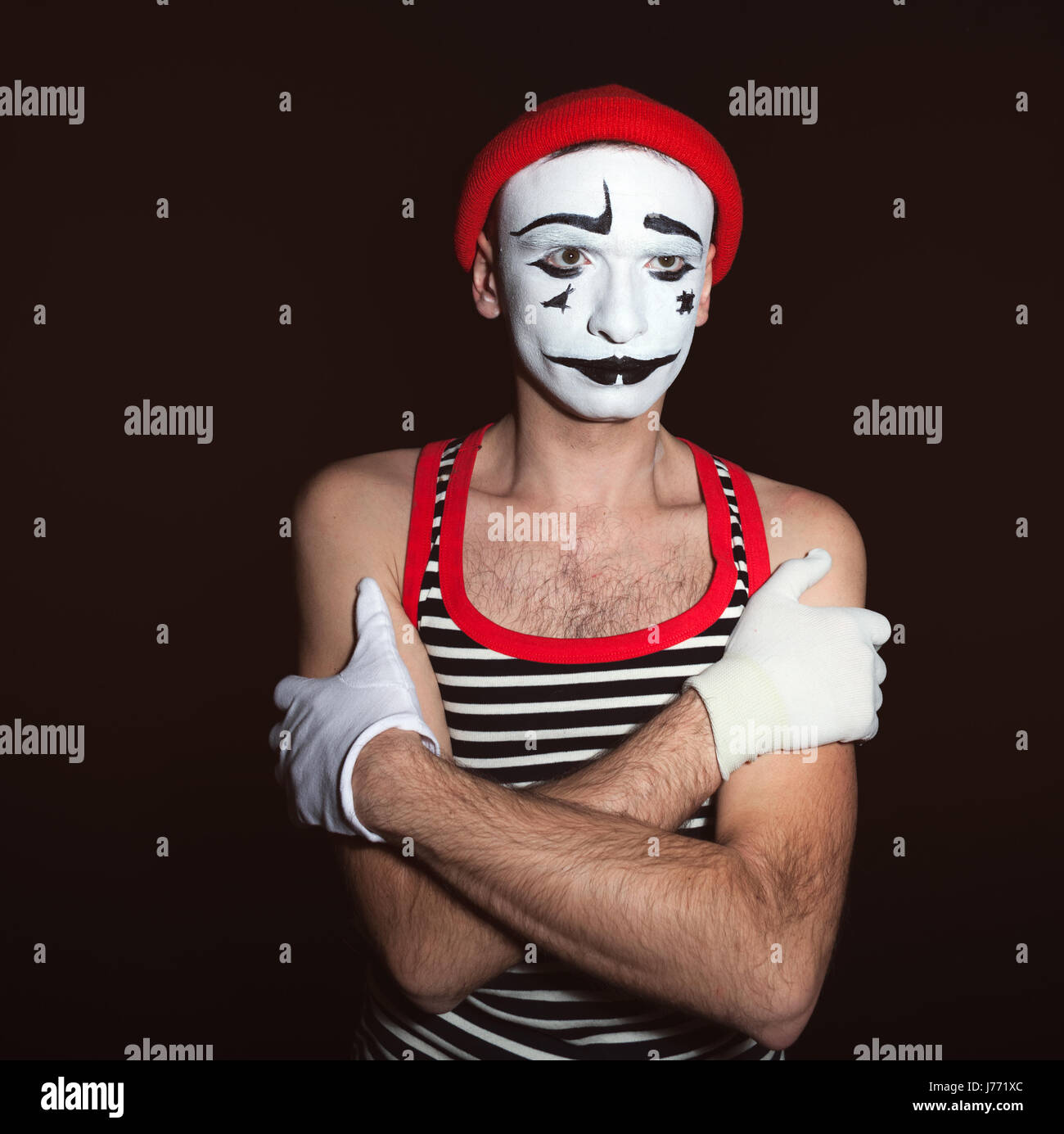 Portrait of a tired thoughtful mime on a black background Stock Photo ...