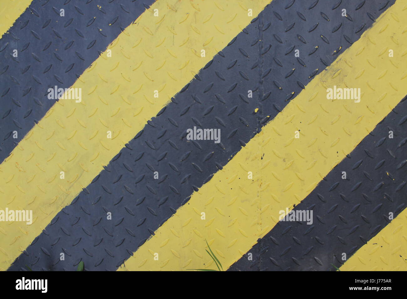 Black and yellow danger warning sign. Attention Stock Photo - Alamy