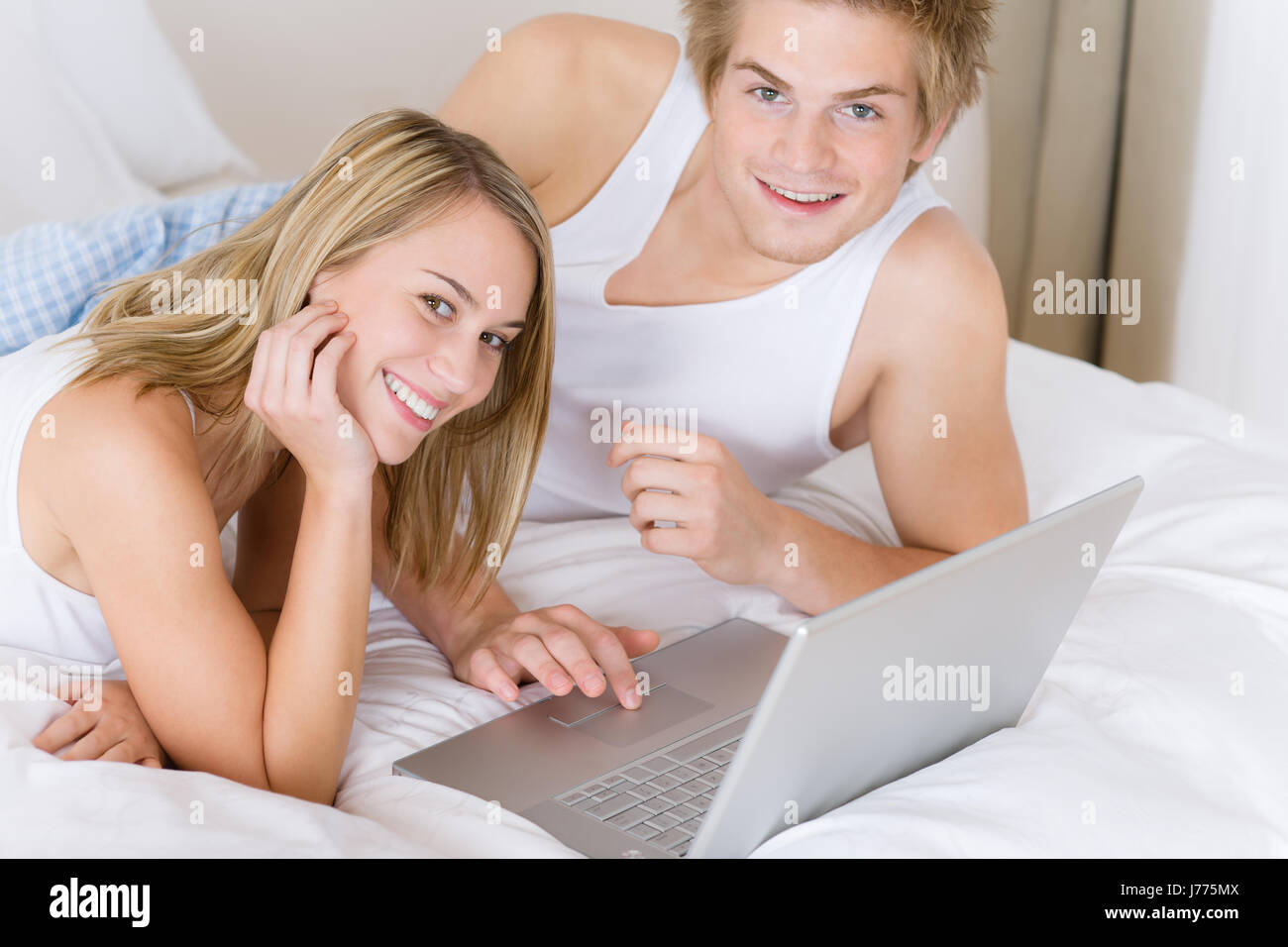 woman laptop notebook computers computer bed facilitate ease resting ...