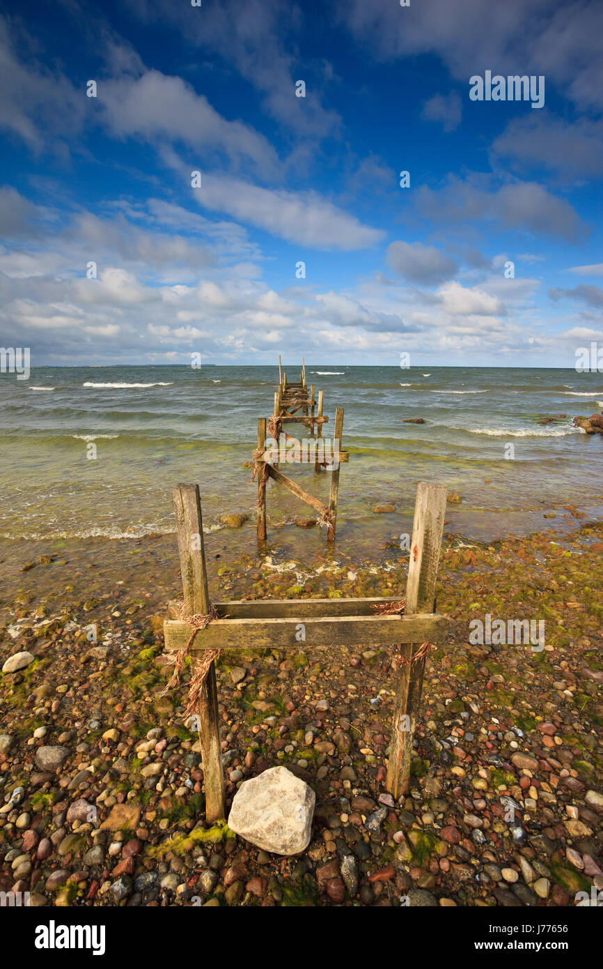 denmark jetty salt water sea ocean water blue horizon stone cloud ...