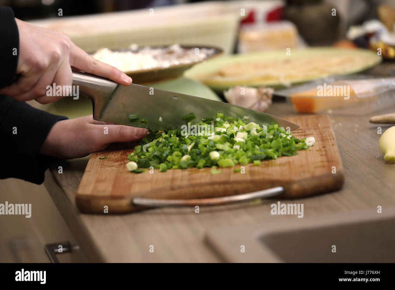 cutting vegetables for salad Stock Photo - Alamy