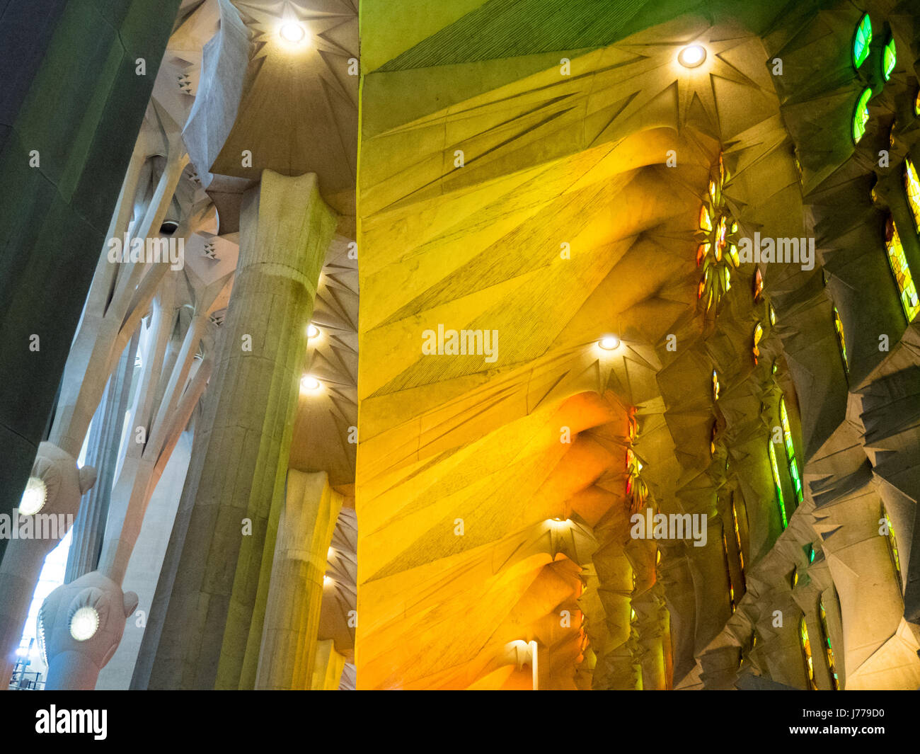 Elaborate and decorative tree like columns and stain glass windows in ...