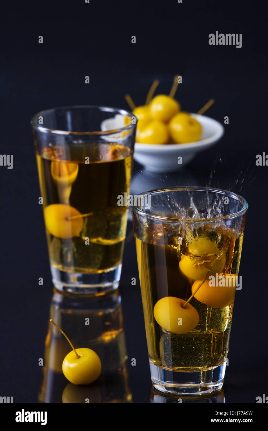 apple falling in juice Stock Photo - Alamy