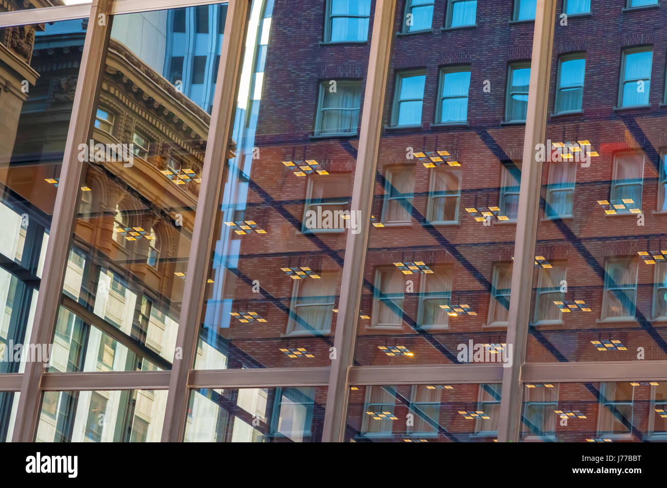 an abstract presentation of the reflections of the adjacent buildings ...